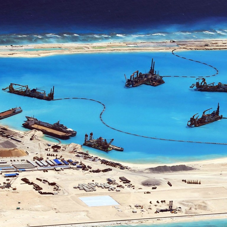 China says land reclamation projects in disputed South China Sea ...