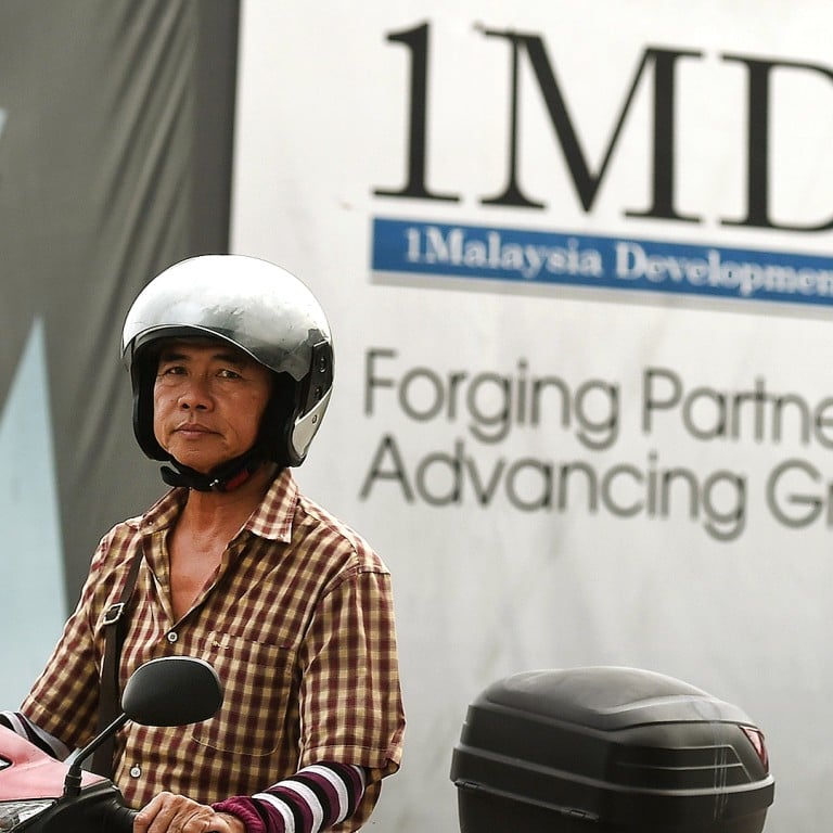 Malaysia suspends newspaper in 1MDB scandal amid fears over press ...