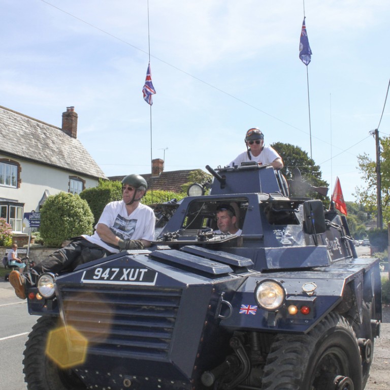 Hong Kong's Saracen armoured police cars on patrol in small-town ...