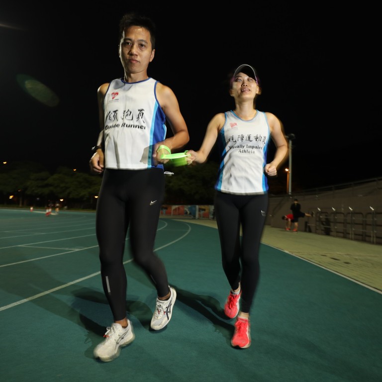 Hong Kong runners prove love is blind as visually impaired woman and ...