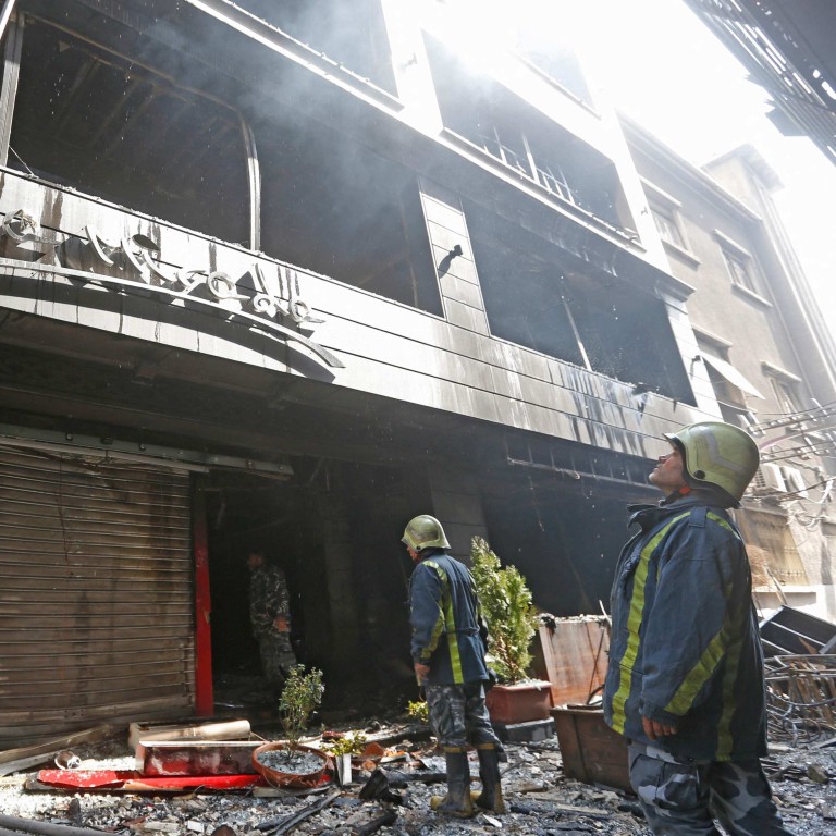 11 killed in Syria as blaze rips through Damascus shopping centre ...