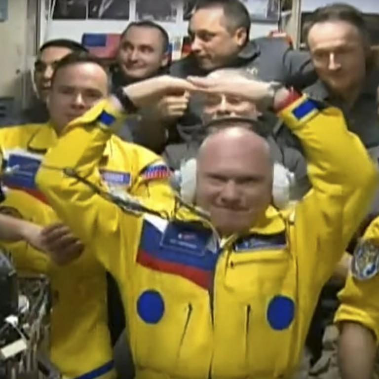 Russia ridicules idea that cosmonauts wore yellow in support of Ukraine ... Russia ridicules idea that cosmonauts wore yellow in support of Ukraine ...