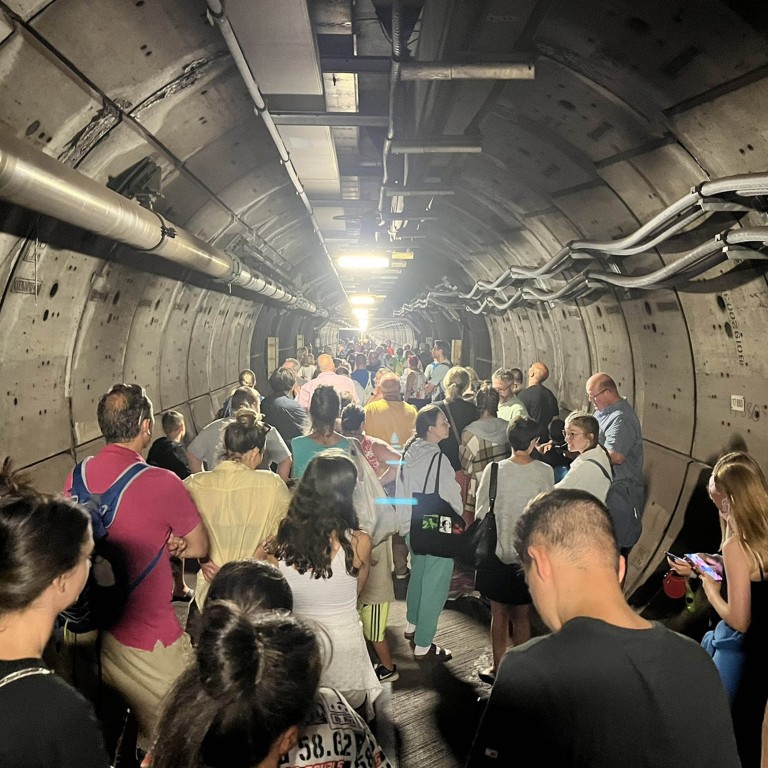 Trapped under the sea: Eurotunnel passengers forced to leave train ...