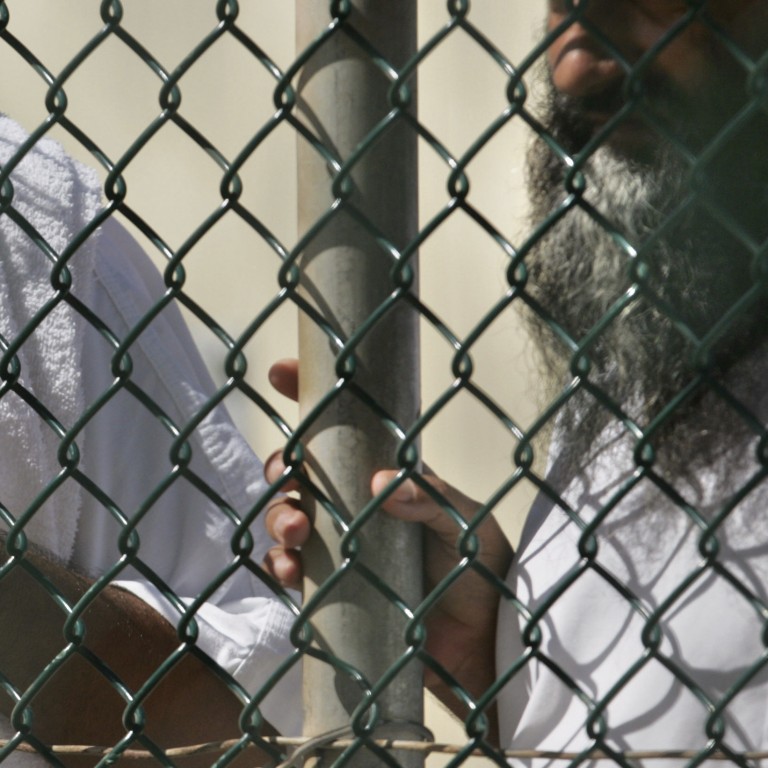 Guantanamo’s oldest prisoner freed and reunited with family in Pakistan ...