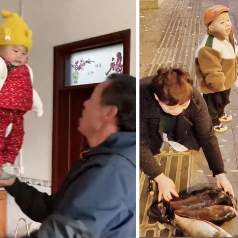 Quirky kids in China: ‘stunt’ baby stands on grandpa’s hand, toddler ...