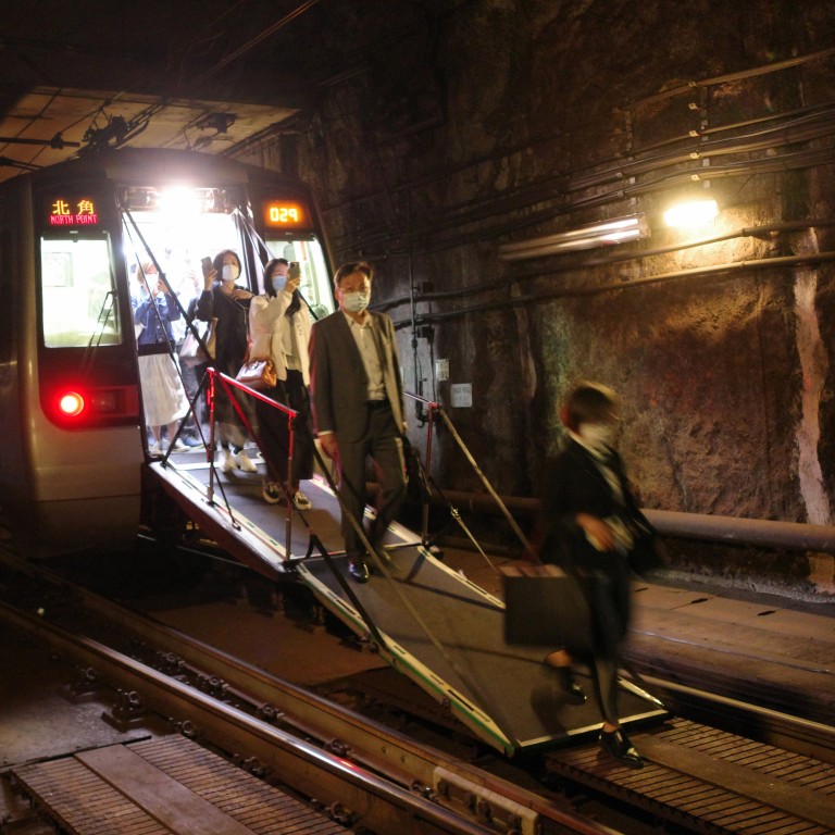 Hong Kong train stuck in tunnel after power lost when cable connecting ...