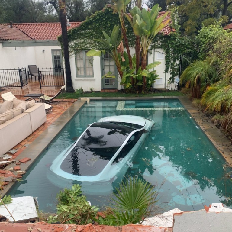 ‘Hero’ bystanders save US family after driver crashes Tesla into pool ...