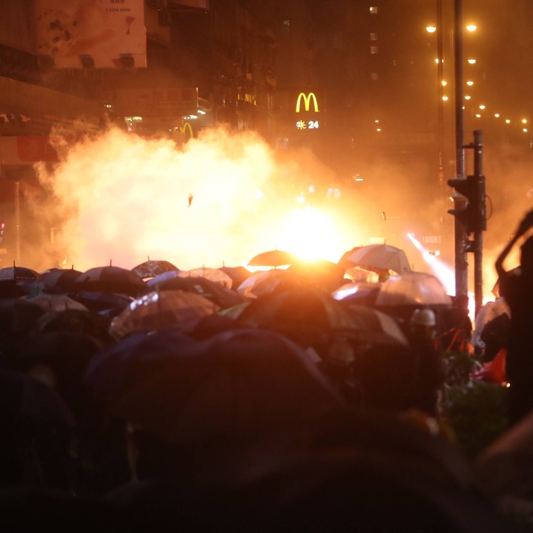 Hong Kong protests: 20 jailed for up to 64 months over riot near ...