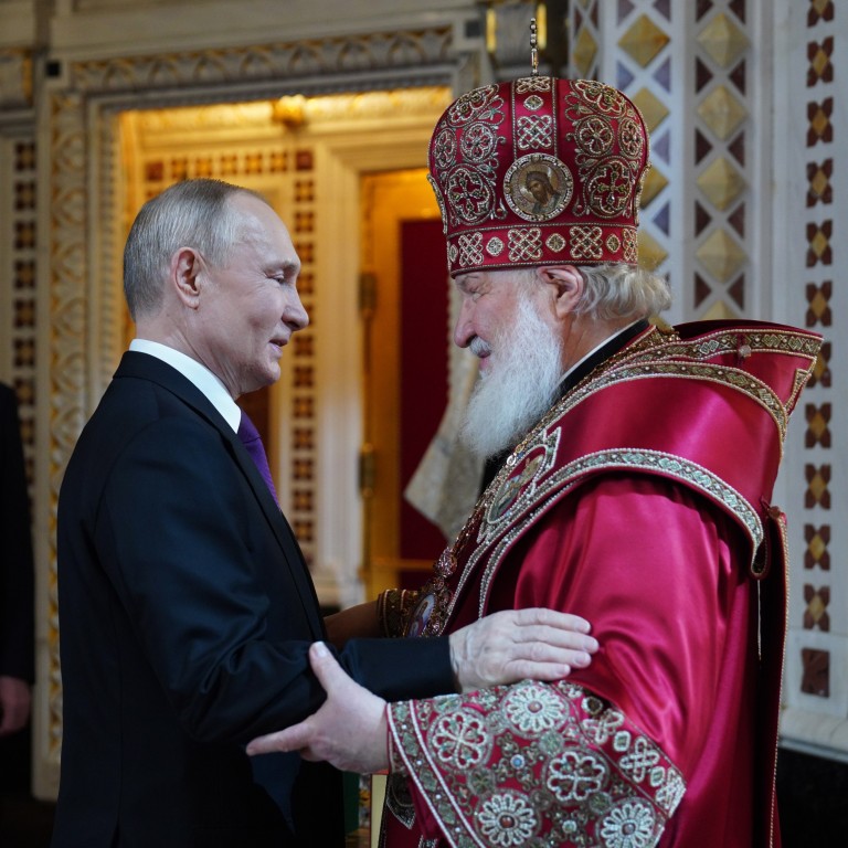 Russia’s Putin applauds ‘strengthening’ role of church on Orthodox ...