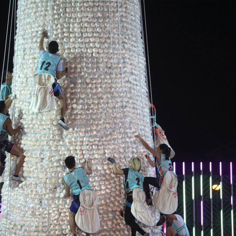 Women finalists of Hong Kong’s bun-scrambling race revel in competition ...