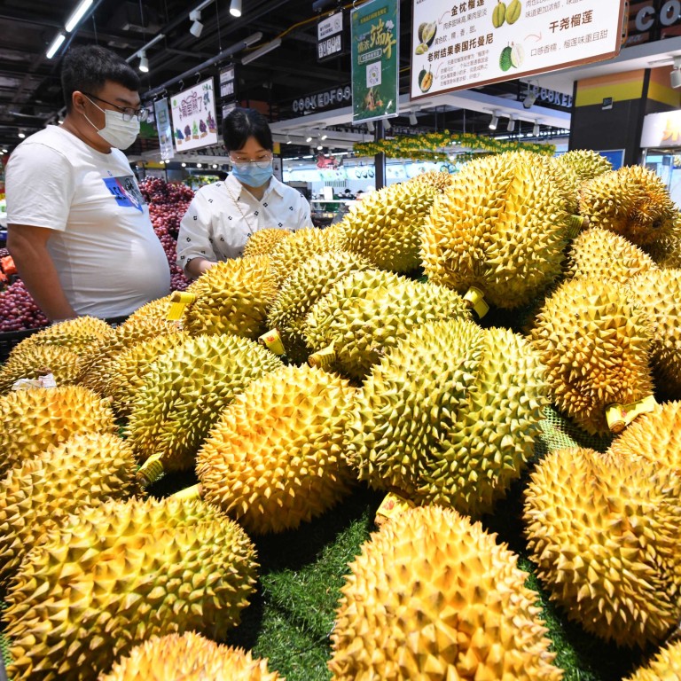 Singaporeans gobble up dirt cheap Malaysian durians as prices crash ...