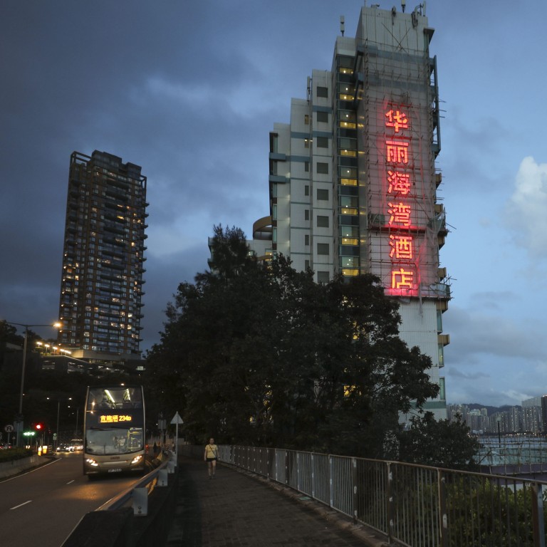 Giant neon sign on Hong Kong hotel sparks heated online debate ...