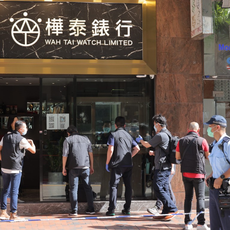 Hong Kong police hunt gang of robbers who escaped with almost HK$4 ...