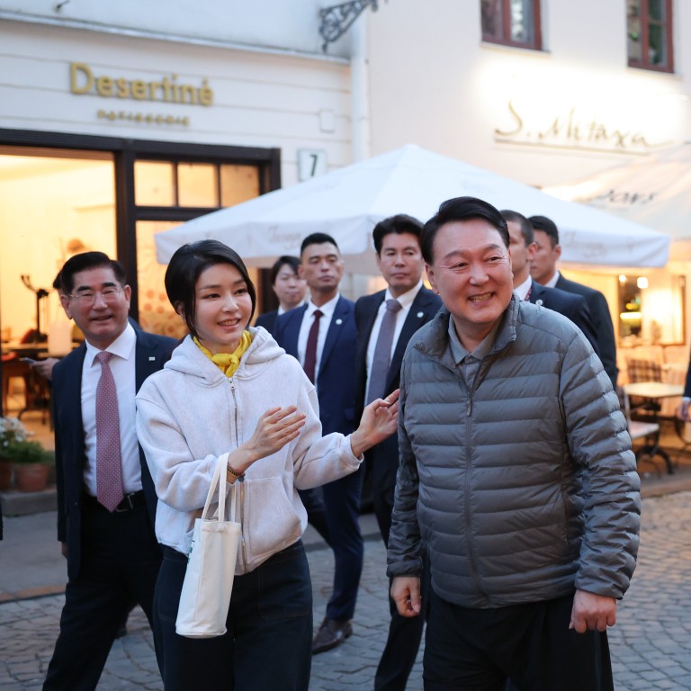 US senator Pete Ricketts greets South Korea’s President Yoon with ...
