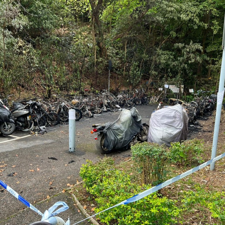 Arson attack in Hong Kong damages 26 motorbikes at outdoor car park ...