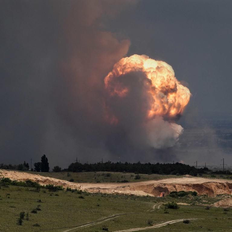 Ukraine: Drone hits Crimean ammunition depot as Russian strikes kill at ...