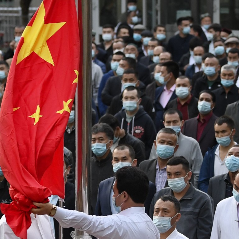 US targets 2 China-based firms over forced labour in Xinjiang | South ...