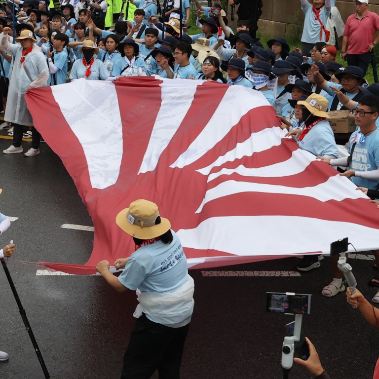 South Koreans rip Japan flag in protest against Fukushima water ...