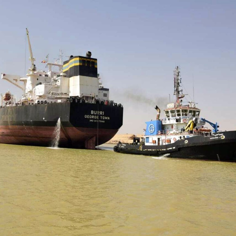 Suez Canal: Singapore-flagged vessel collides with tanker causing ...