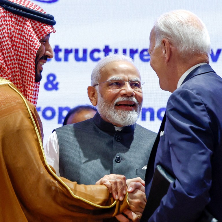 Joe Biden gives Saudi Crown Prince Mohammed bin Salman hearty handshake ...