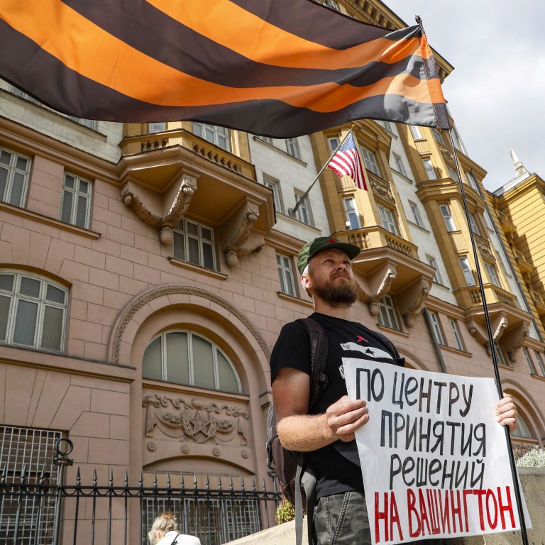 Russia expels two US diplomats for links to ‘spy’ as US sanctions ...