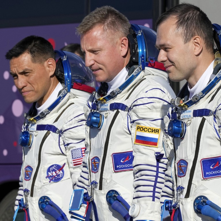 2 Russians, American return to Earth after a year at the International ...