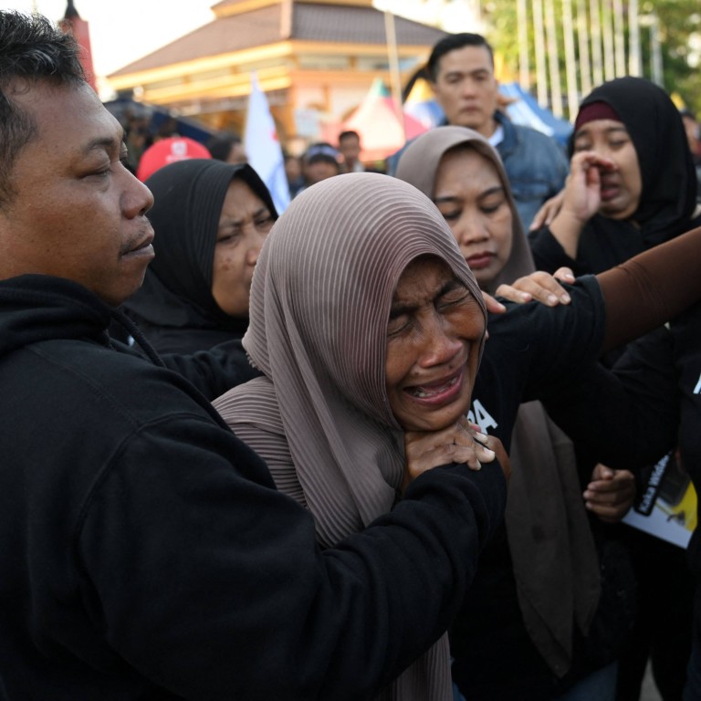 One year after deadly fan crush at Indonesia football stadium, families ...