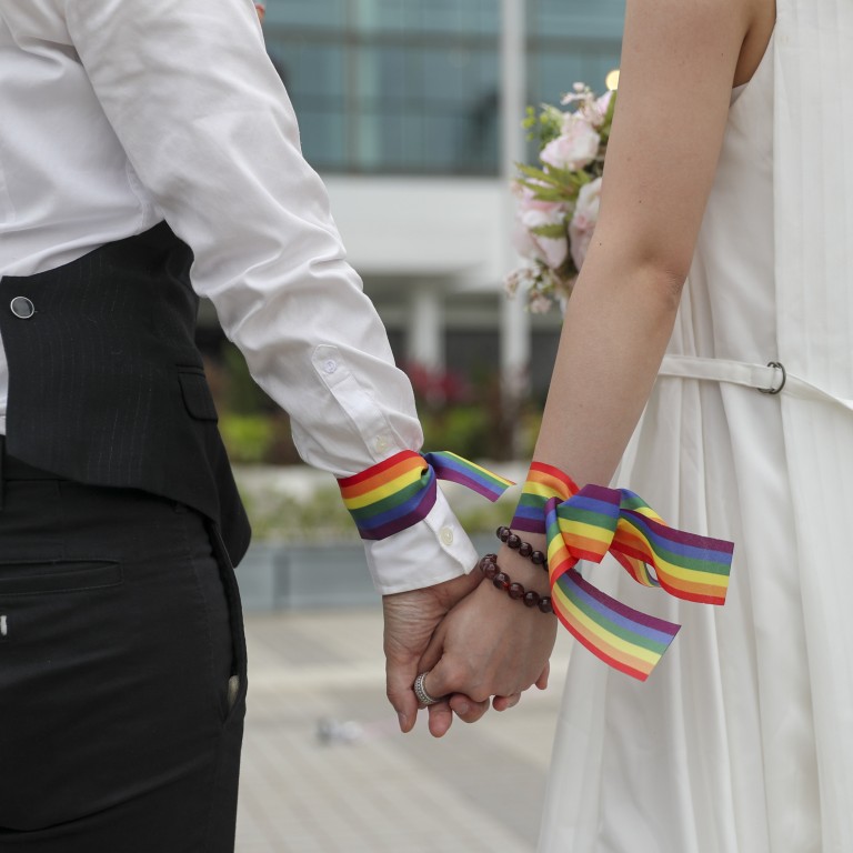 Hong Kong legal experts praise ruling for lesbian couple given equal ...