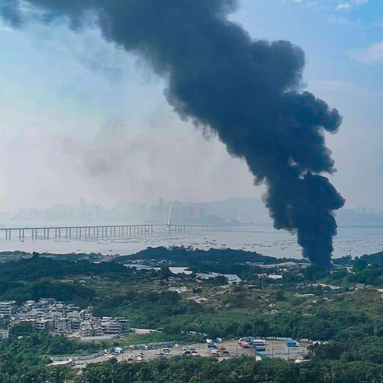 2 Hong Kong firefighters injured while battling third-alarm blaze at ...