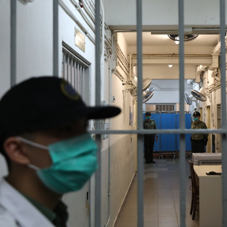 Hong Kong opposition activist seeks judicial review after prison bans ...