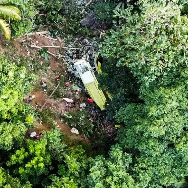 At least 17 dead as bus plunges off ‘killer curve’ in Philippines ...
