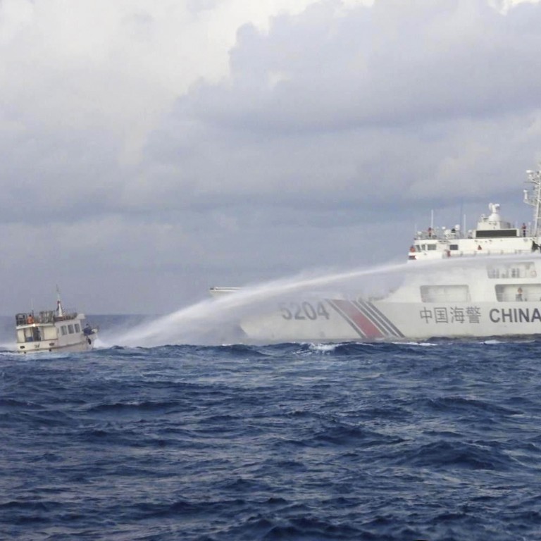 South China Sea: Beijing will ‘respond resolutely’ if Manila builds ...