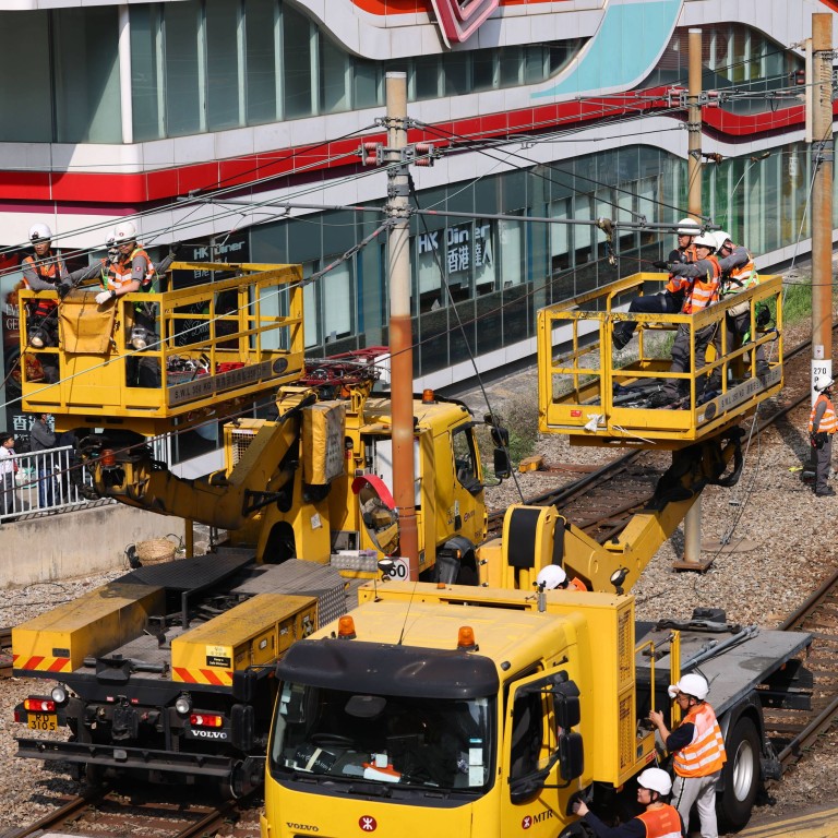 Driver arrested after crane truck hits overhead cable, disrupting ...