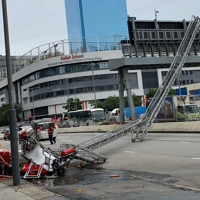 Fire truck aerial ladder collapses, blocks traffic on main road in Hong ...