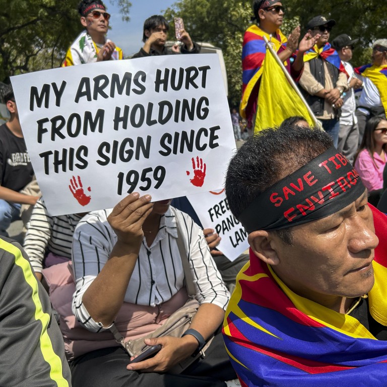 Hundreds of exiled Tibetans march in India on uprising anniversary ...