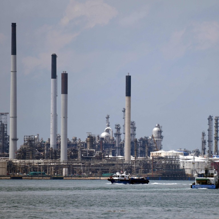 Oil giant Shell sells Singapore refinery it built on Bukom island over ...