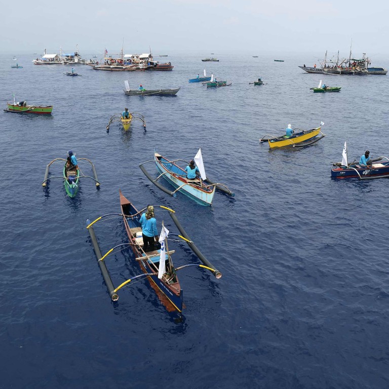 South China Sea: Philippine civilian boat convoy drops plan to sail ...
