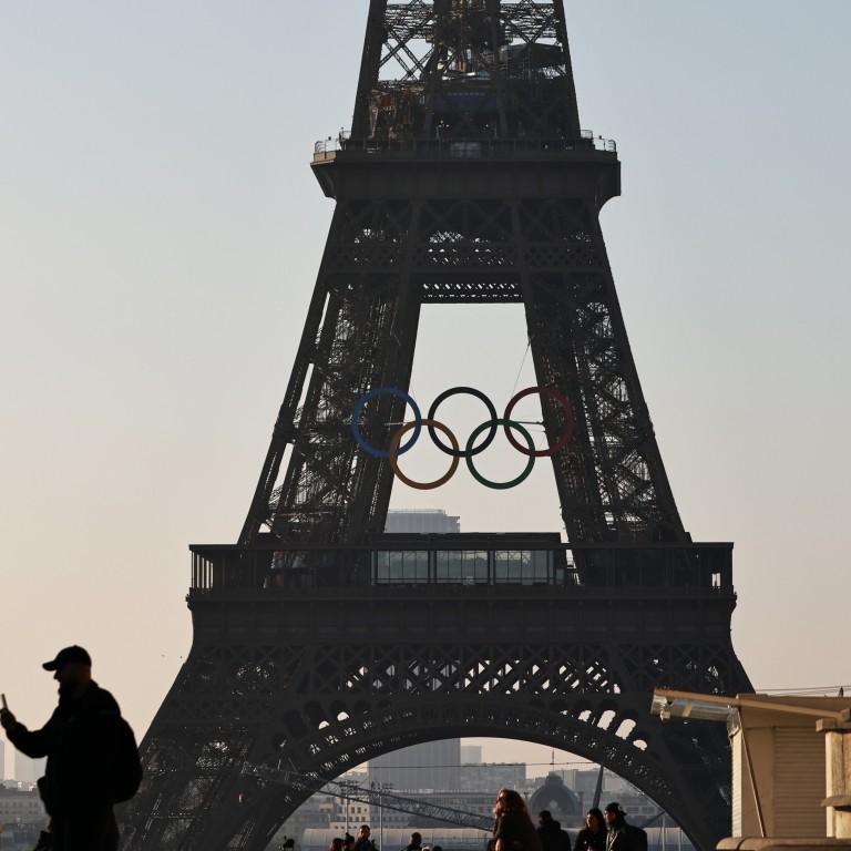 Olympic rings decorate Eiffel Tower as Paris marks 50 days to go until ...