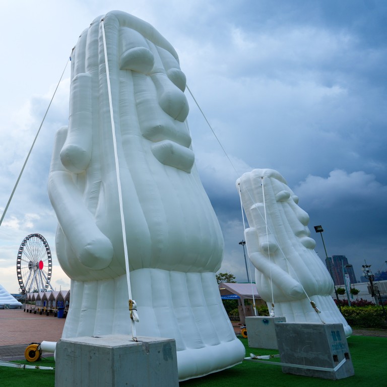 Inflatable replicas of world landmarks defended by Hong Kong art show ...