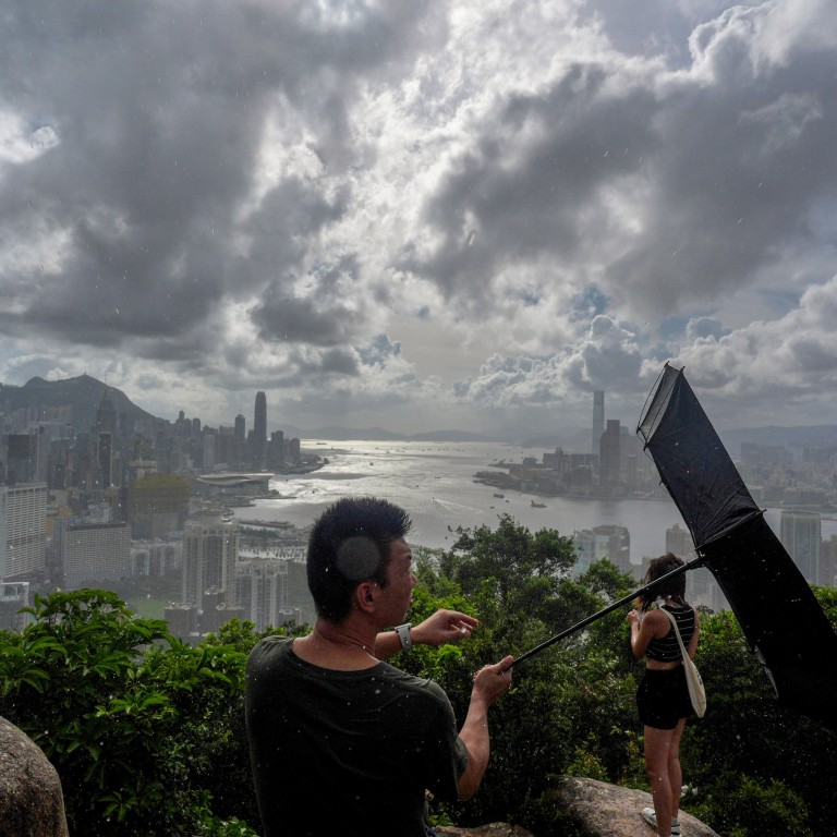 Hong Kong Observatory says T1 typhoon warning to stay in force until at ...
