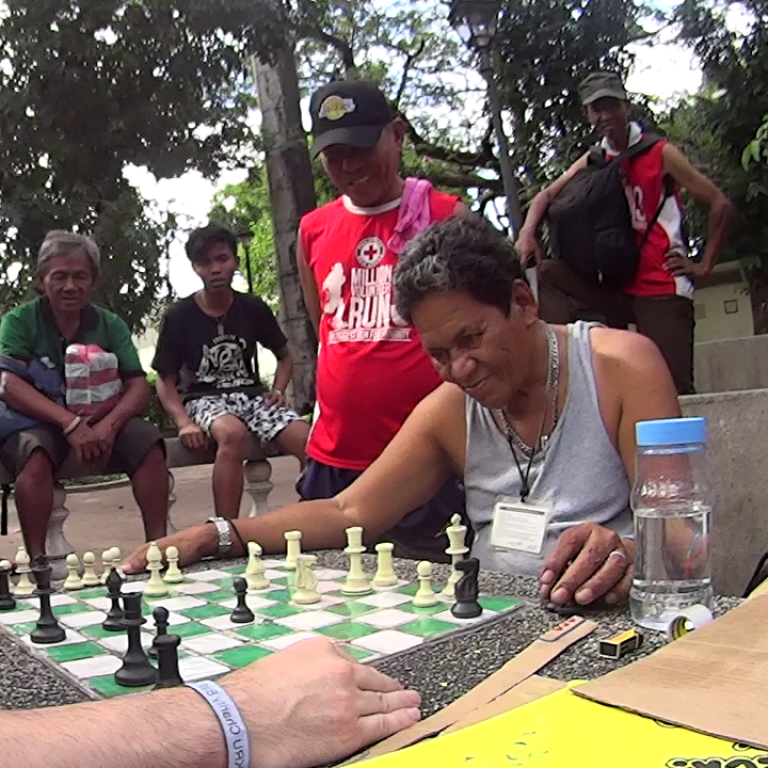 Checkmate Manila: pawns, paws and a grand chess game in the Philippine ...