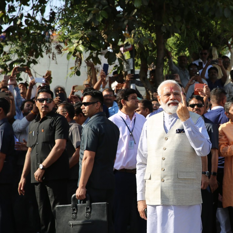 India election: Prime Minister Narendra Modi votes in third phase of ...