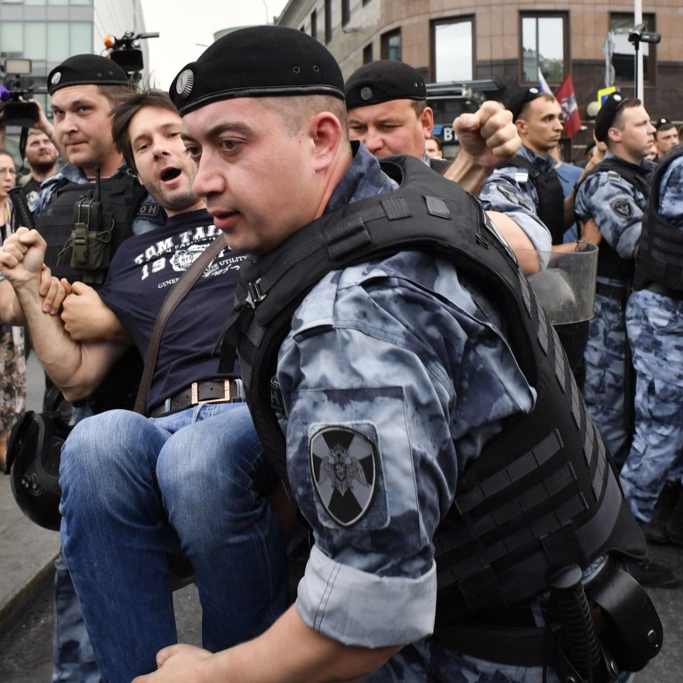 ‘Stop police terror’: More than 200 arrested in Moscow at Russia Day ...