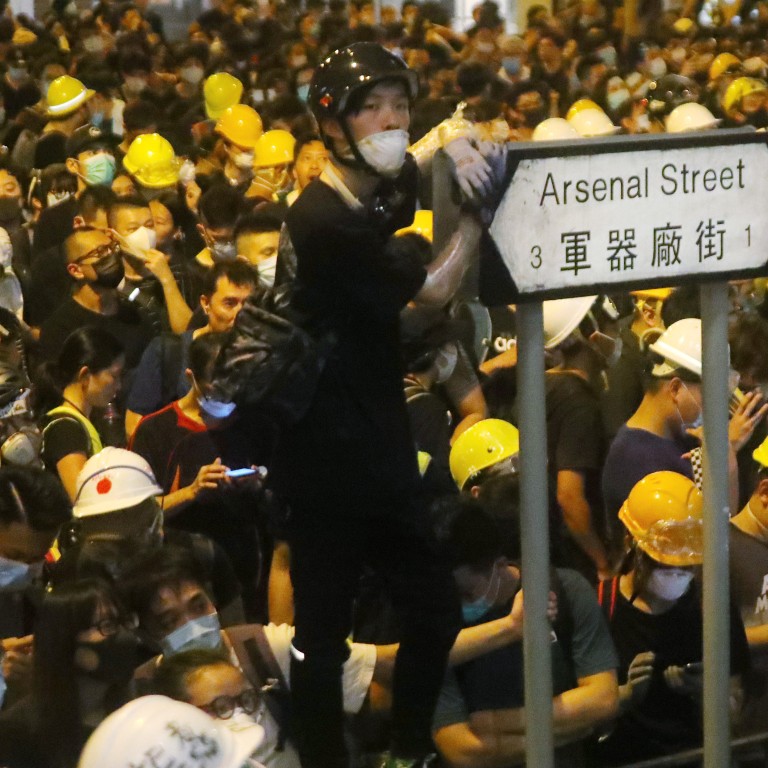 Hard hats, face masks and goggles: the essential wear for Hong Kong ...