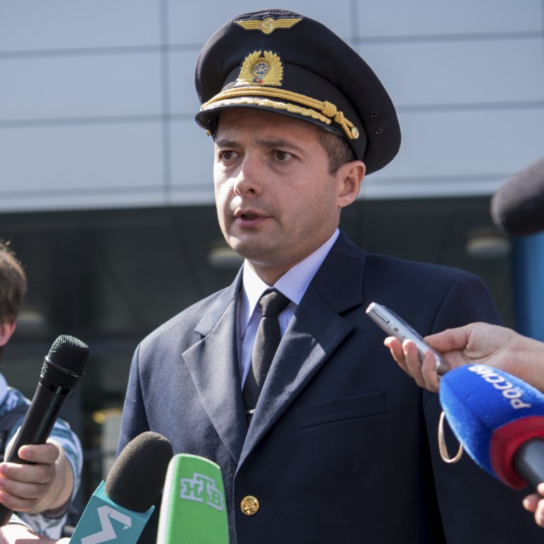 Vladimir Putin awards Russia’s top medal to pilot Damir Yusupov for ...