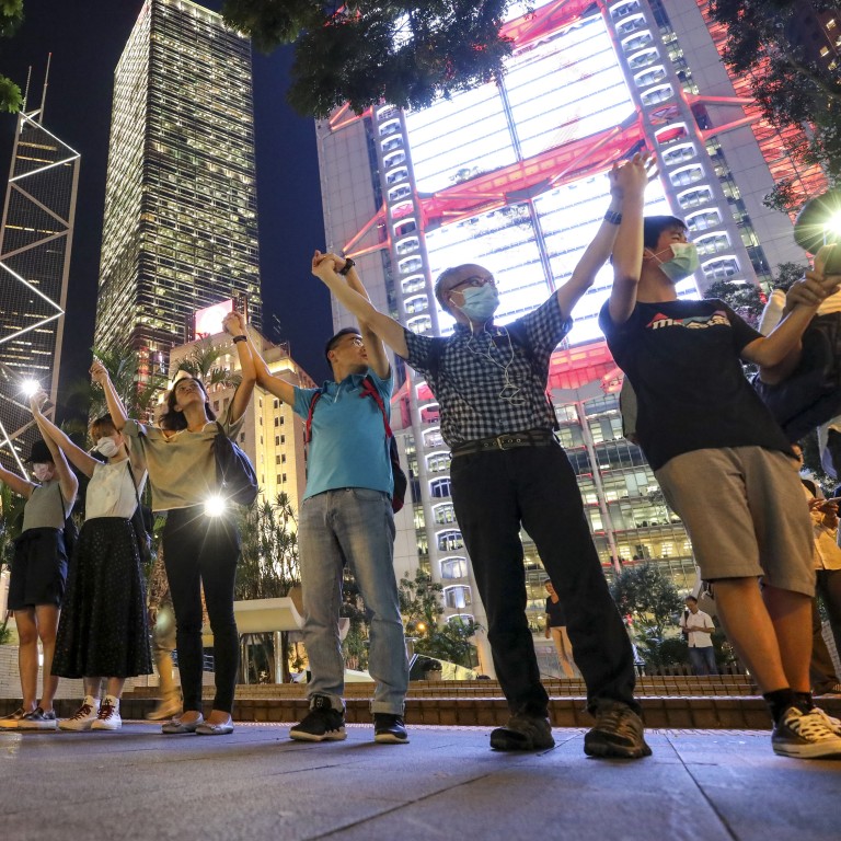 Demonstrators offer sparkling visions of unity as human chains encircle ...