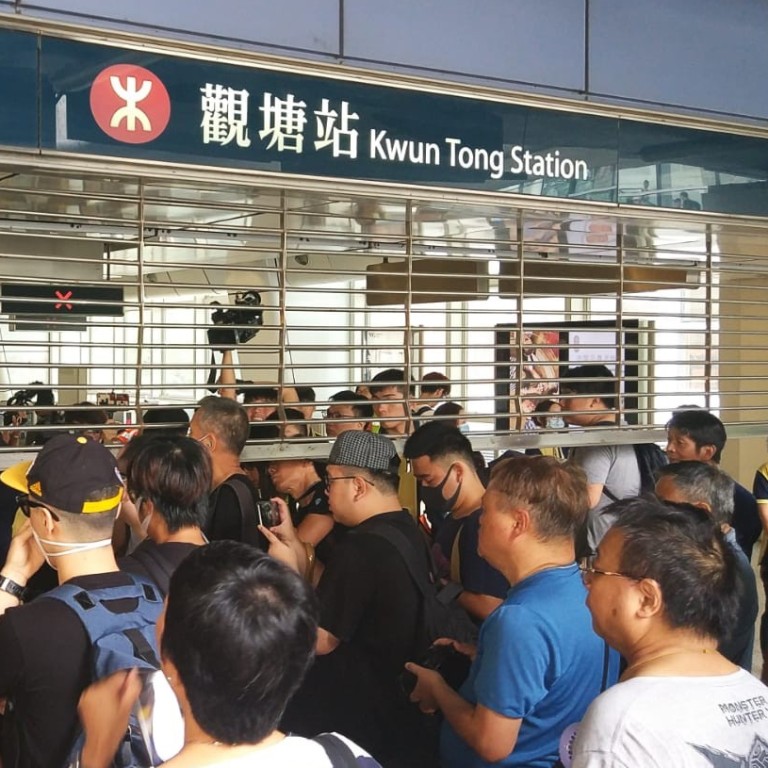 Angry residents confront Hong Kong’s MTR staff over closure of train ...