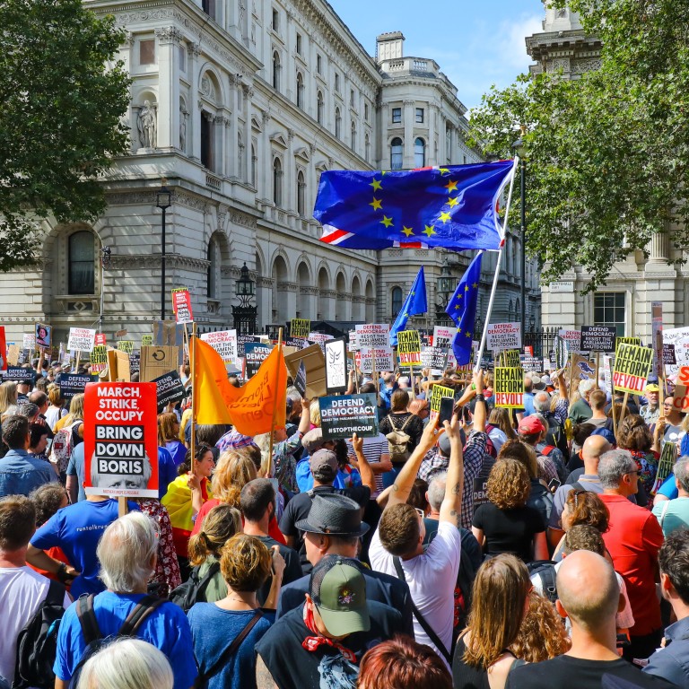 Thousands in UK protest against Boris Johnson’s move to suspend ...