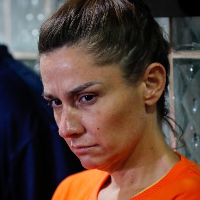 US woman who hid baby in carry-on bag arrested for human trafficking in ...