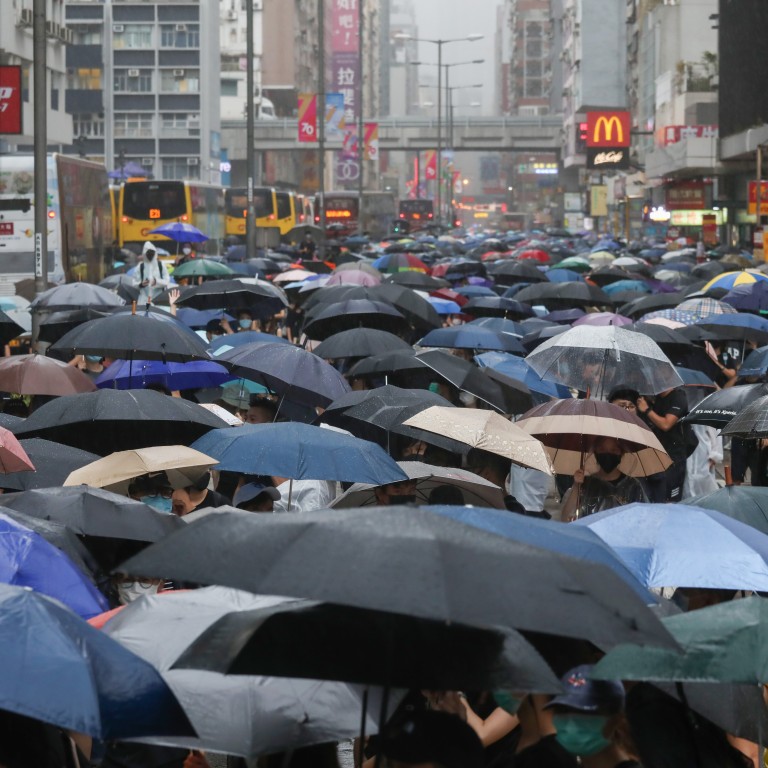Hongkongers struggle to get around city as protesters block roads ...